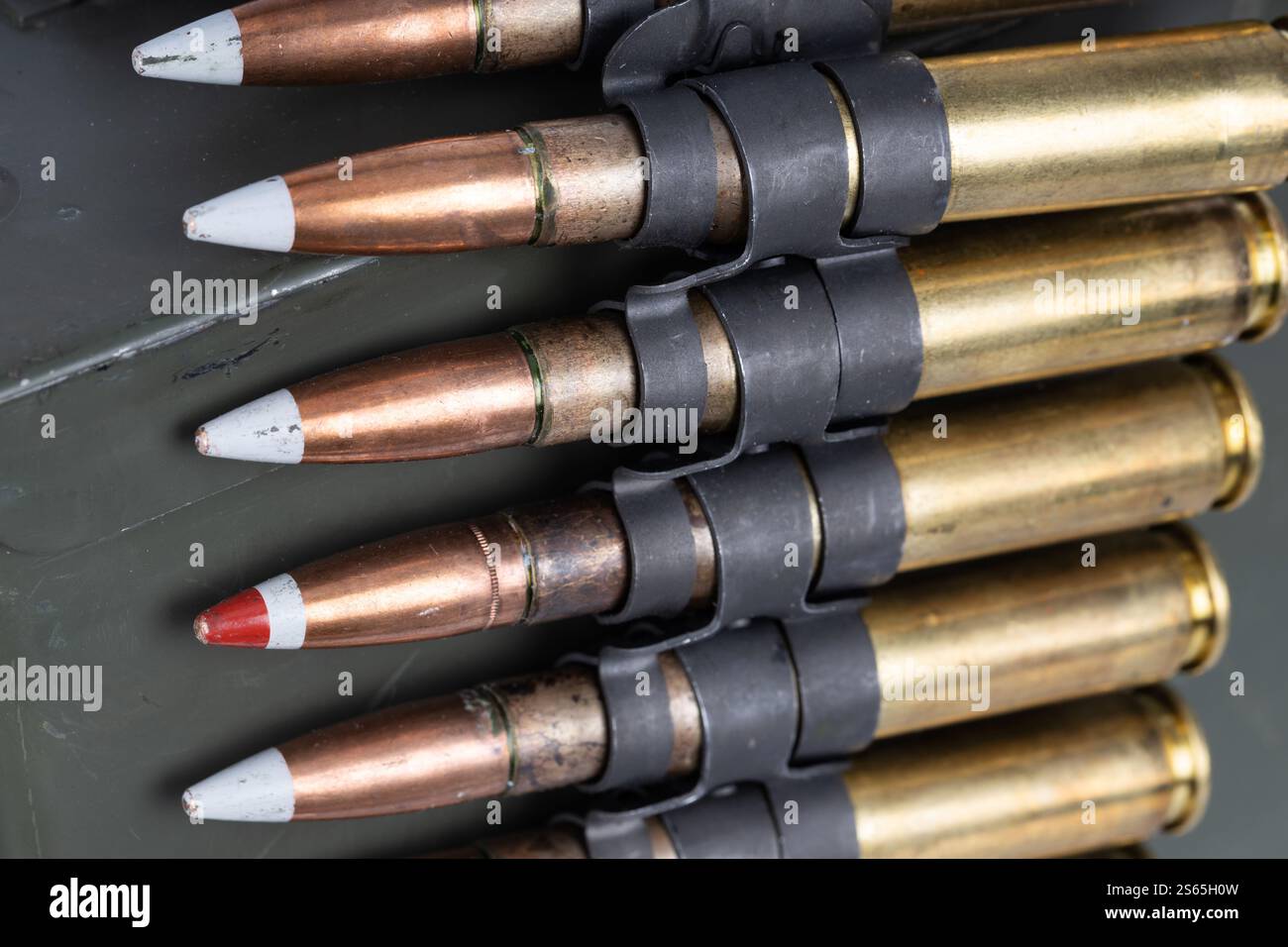 .50 BMG caliber machine gun ammunition belt with cartridges in ...