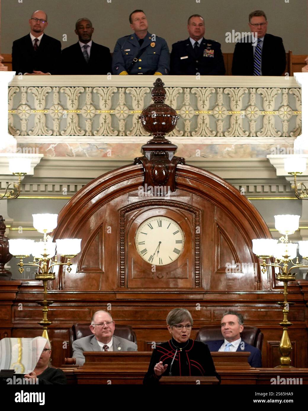 Flanked by Speaker of the House Daniel Hawkins, left, and Senate ...