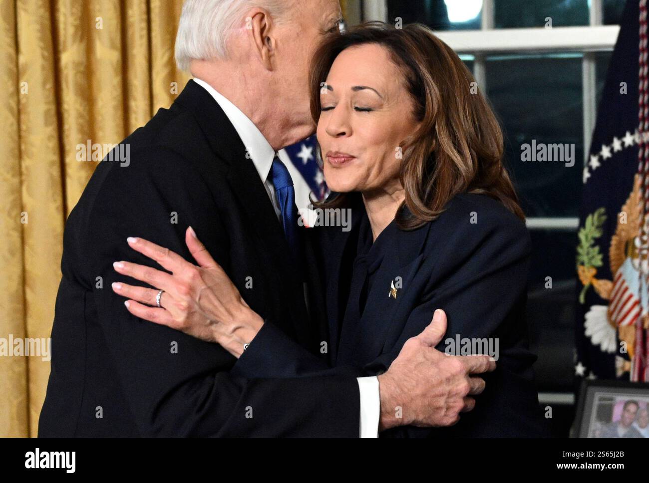 President Joe Biden hugs Vice President Kamala Harris after giving his ...