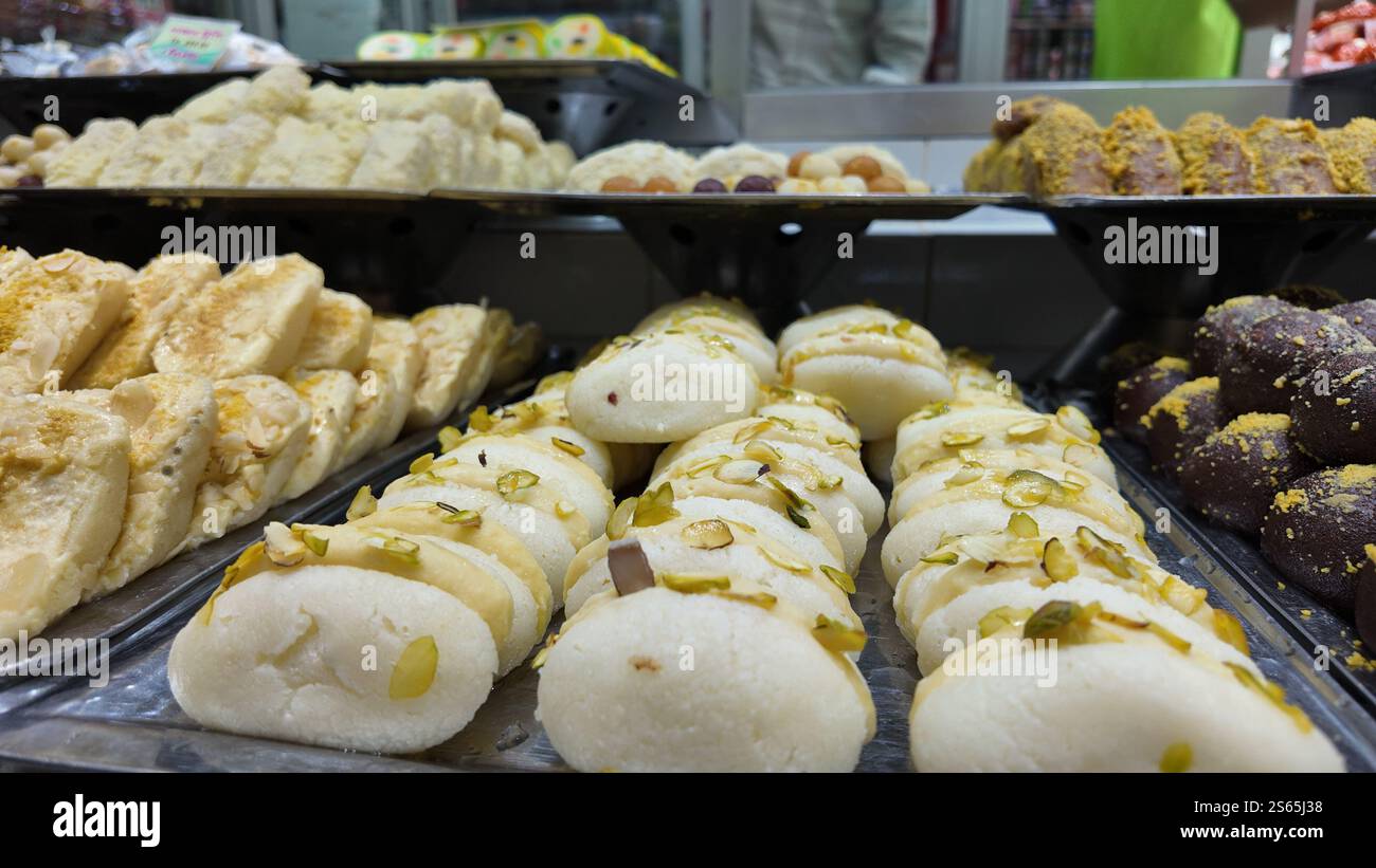 Colorful indian sweets displayed local hi-res stock photography and ...
