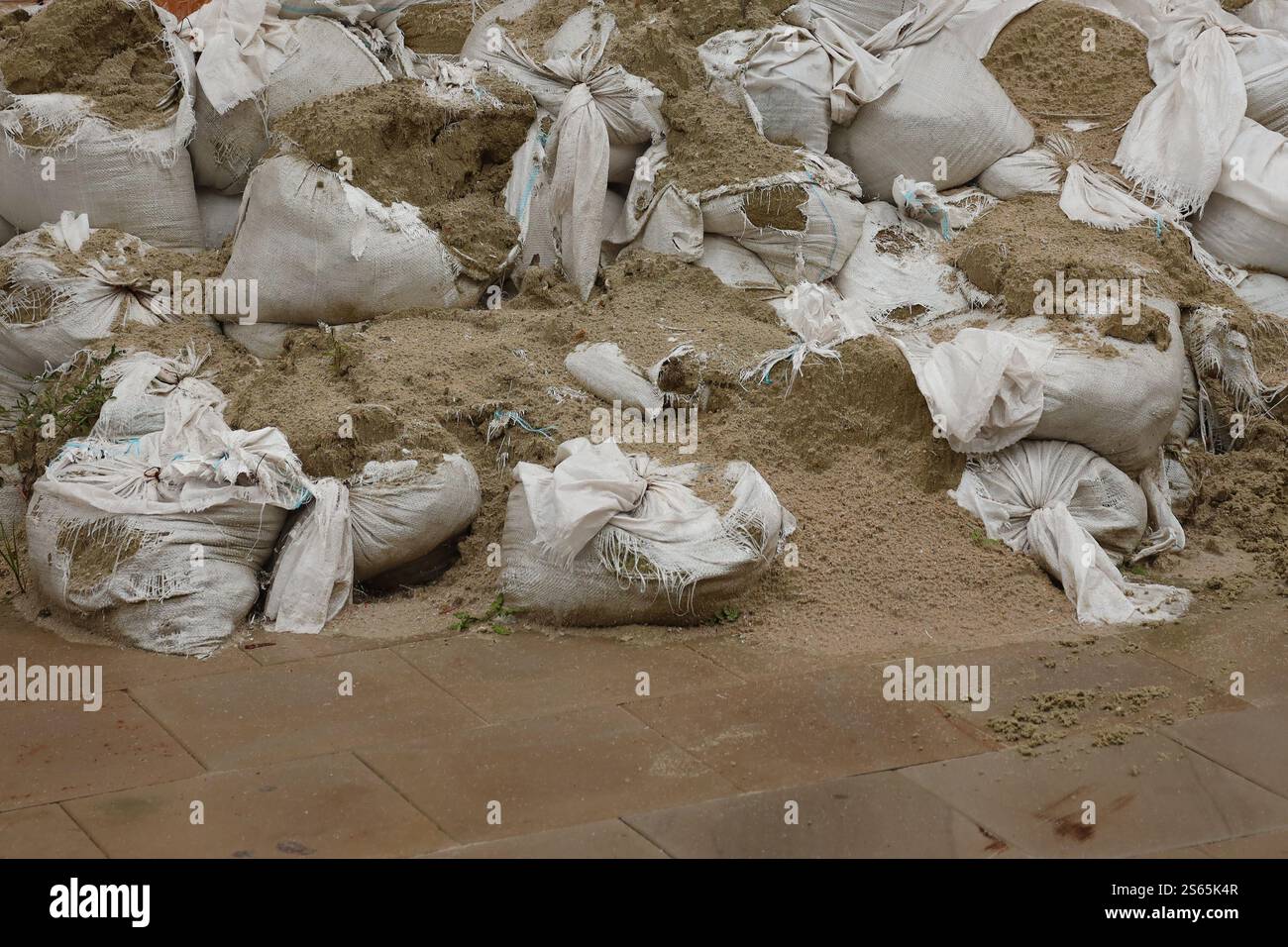 Texture of broken barricade wall made of white sandbags for war ...