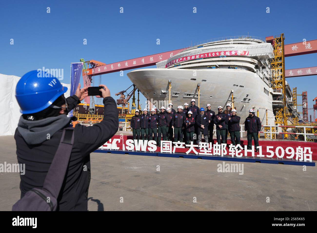 Shanghai,China.15th January 2025. Engineers pose for a group photo in ...