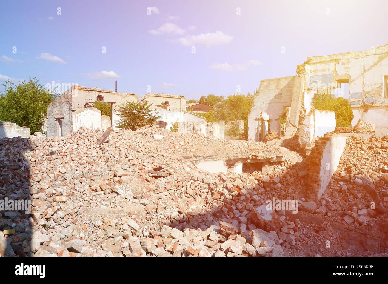 Collapsed industrial multistorey building in daytime. Disaster scene ...