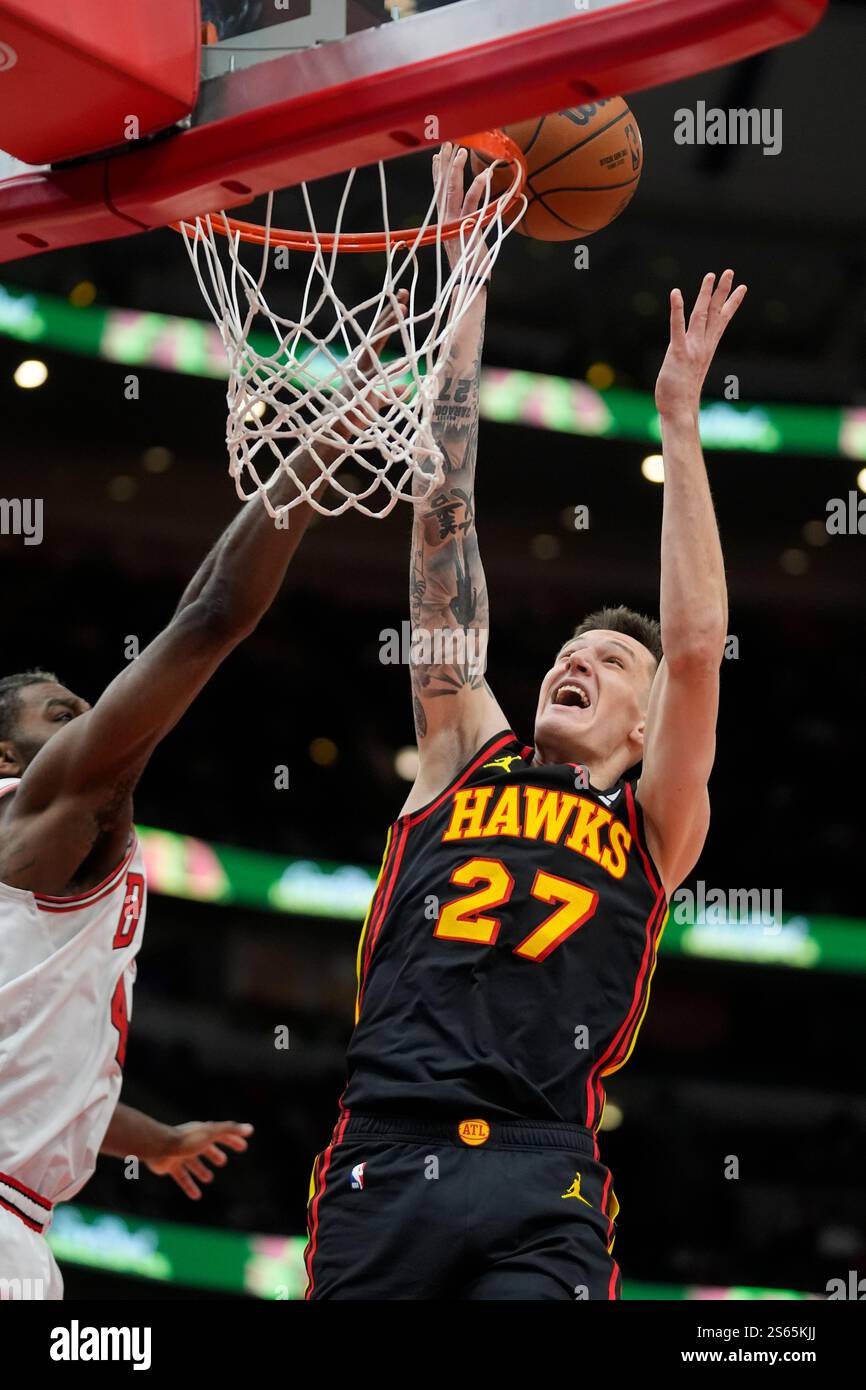 Chicago Bulls forward Patrick Williams (44), left, fouls Atlanta Hawks ...