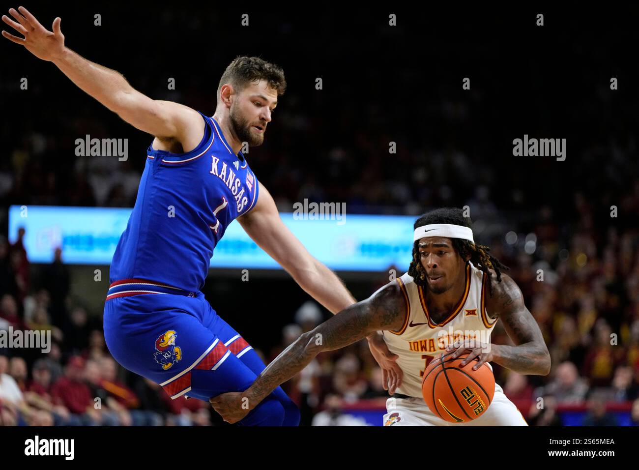 Iowa State guard Keshon Gilbert drives past Kansas center Hunter ...