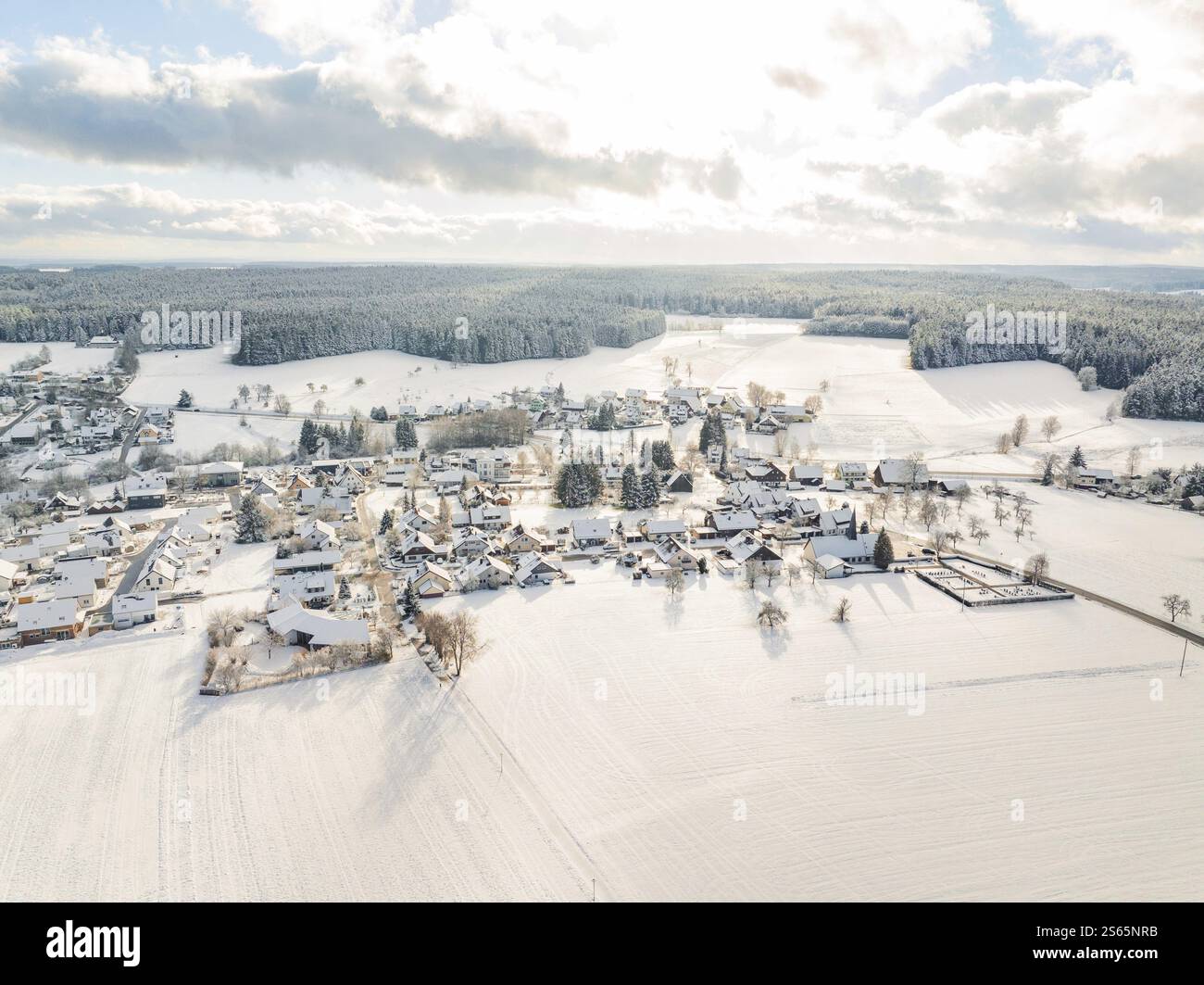 Bird's eye view of a snow-covered village in the winter landscape ...