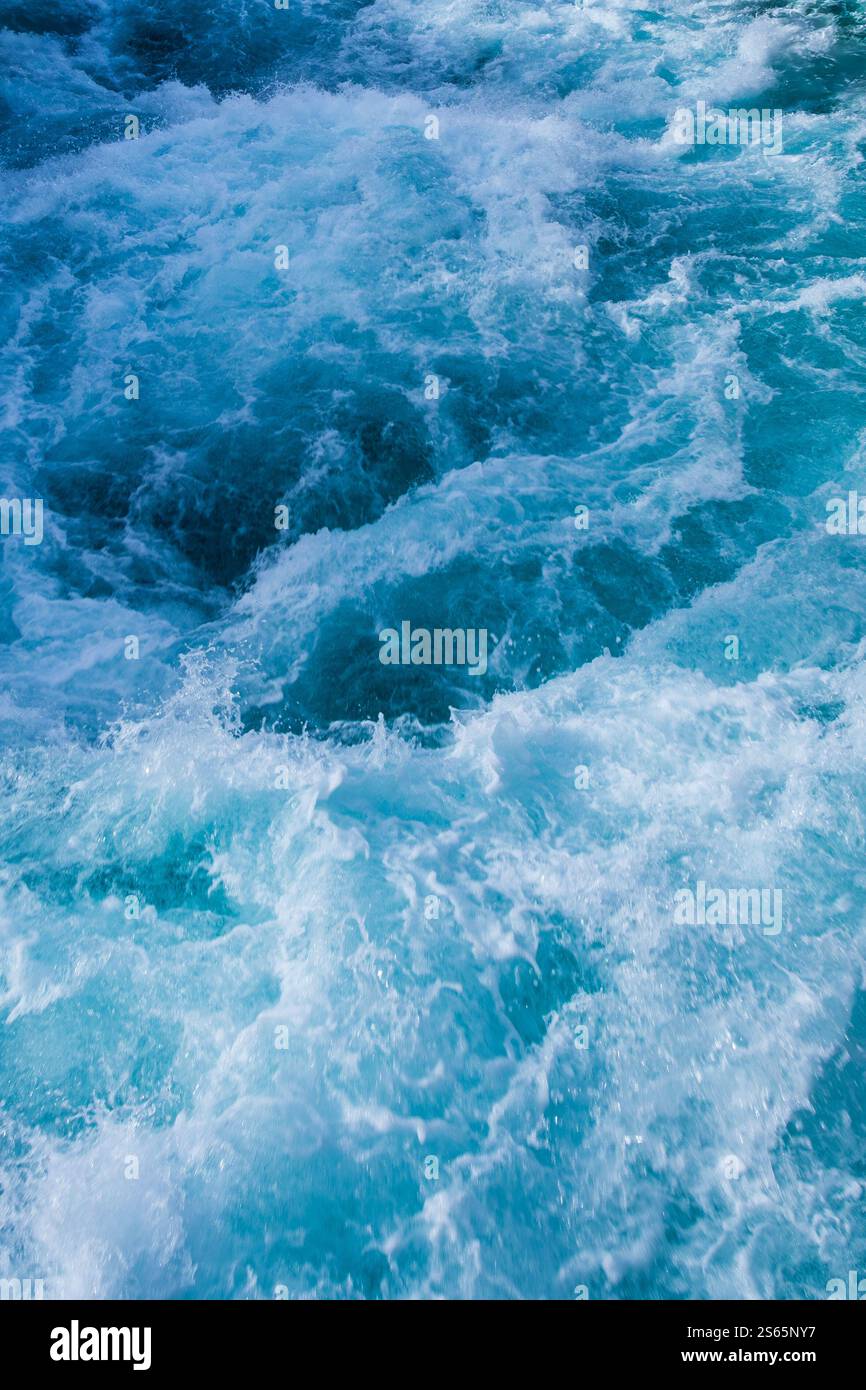 The massive amount of glacial water surging down the river causes a ...