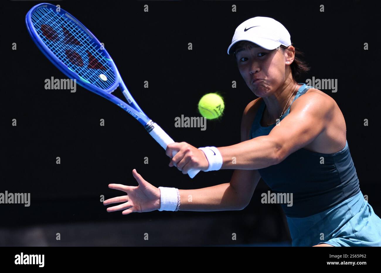 Melbourne, Australia. 16th Jan, 2025. Xiyu Wang of China returns in ...