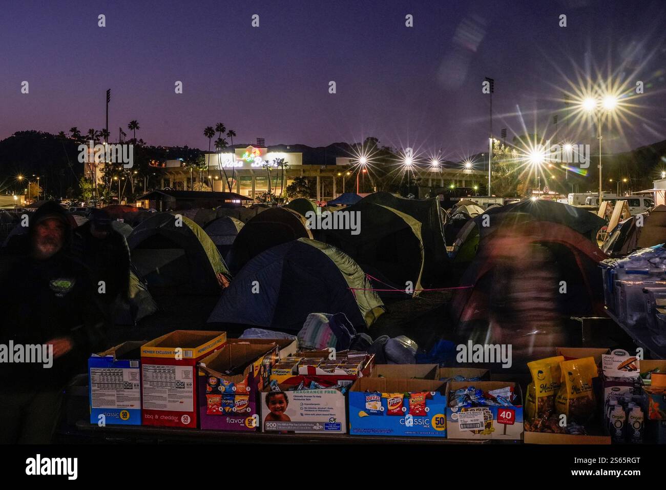 In this photo taken with a long exposure, camping tents for first ...