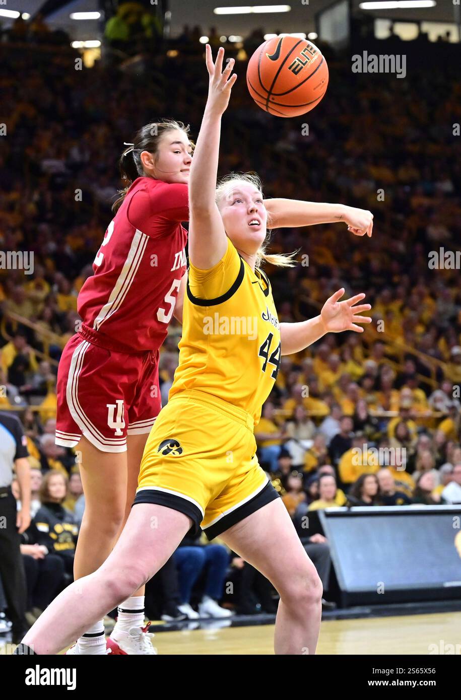IOWA CITY, IA - JANUARY 12: Iowa center Addison O'Grady (44) reaches up ...