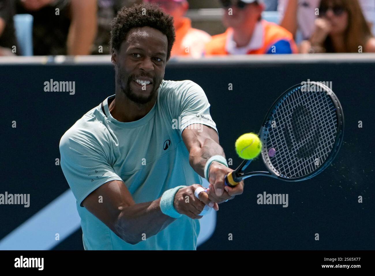 Gael Monfils of France plays a backhand return to Daniel Altmaier of ...