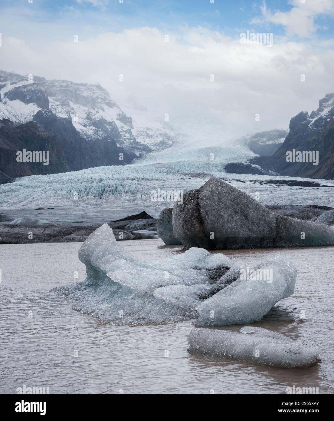 Glacier tongue slides from the Vatnajokull icecap or Vatna Glacier near ...