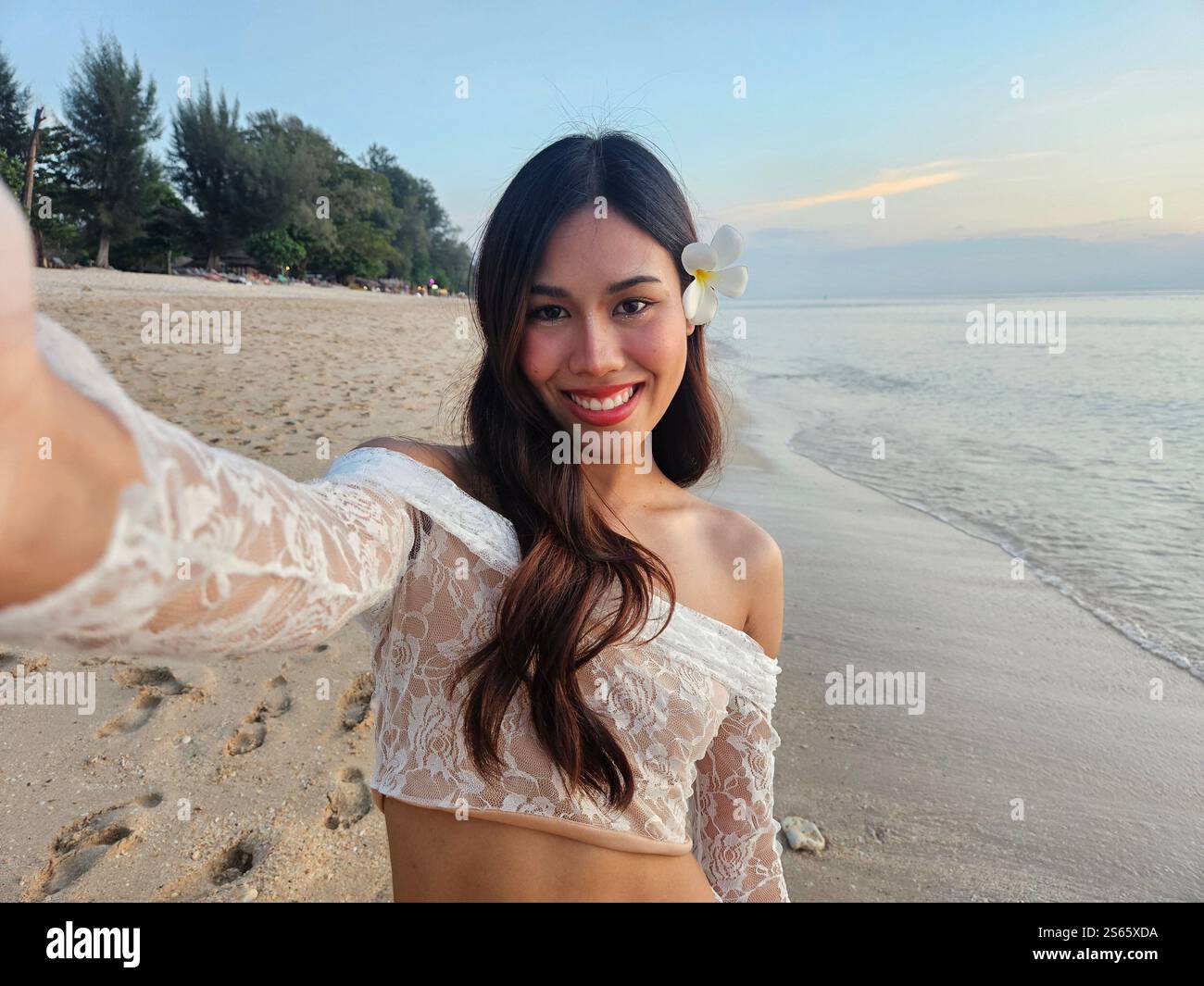 On beach woman taking selfie hi-res stock photography and images - Alamy