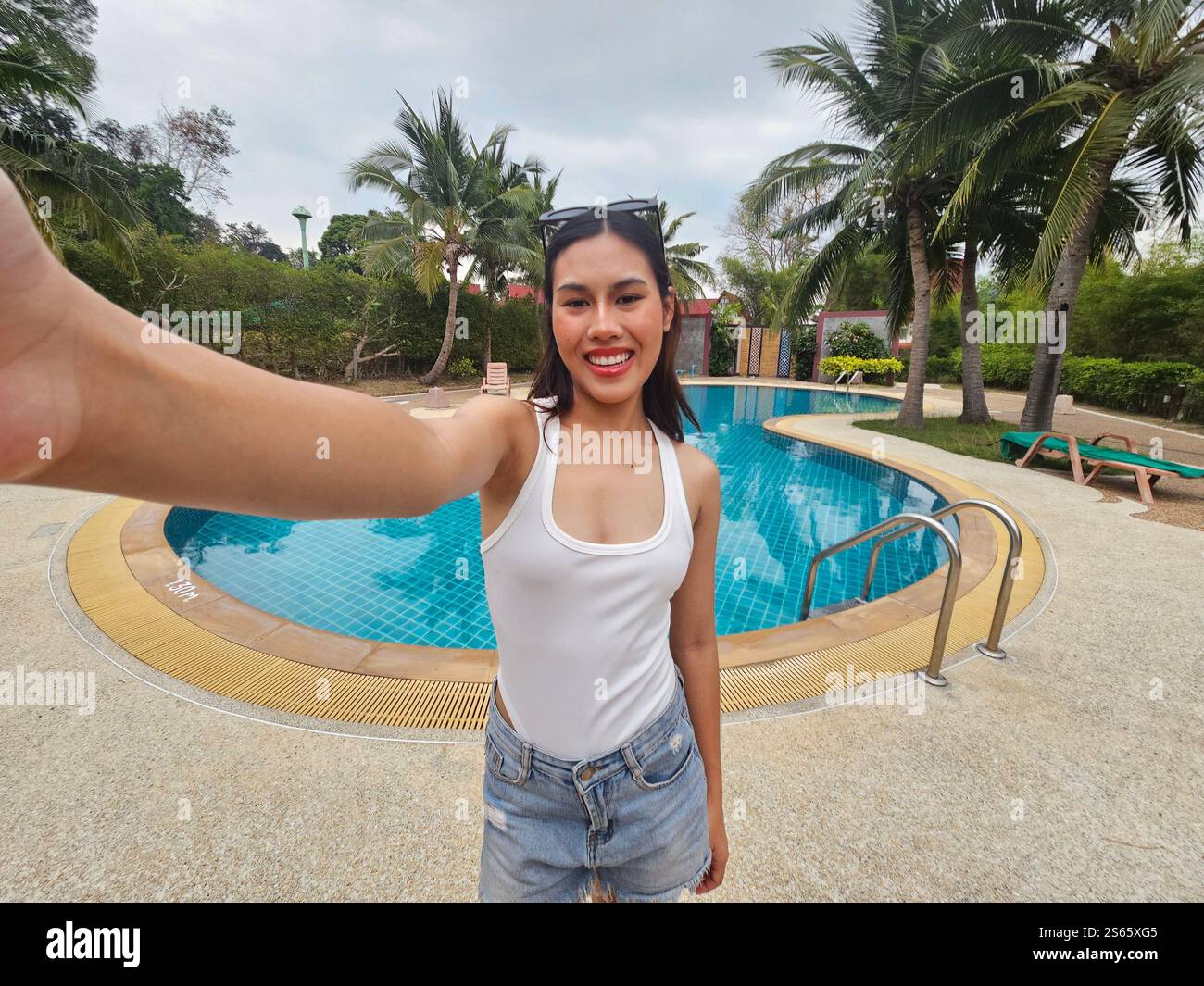 Woman taking video selfie in hi-res stock photography and images - Alamy