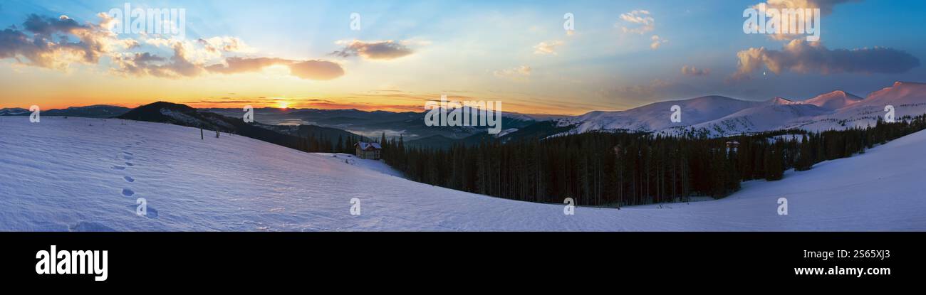 Mountain ridge sunrise panorama view with moon and sun (Drahobrat Ski ...