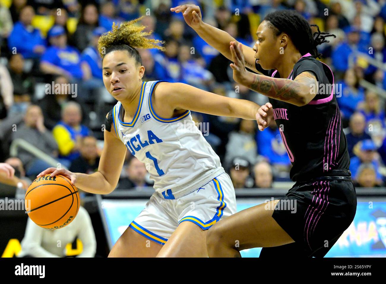 UCLA guard Kiki Rice, left, is defended by Penn State guard Gabby ...