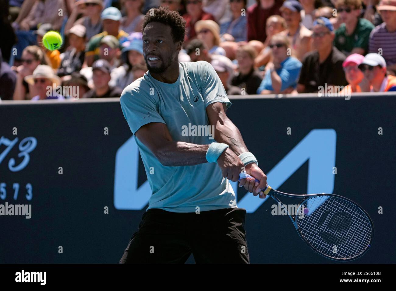 Gael Monfils of France plays a backhand return to Daniel Altmaier of ...