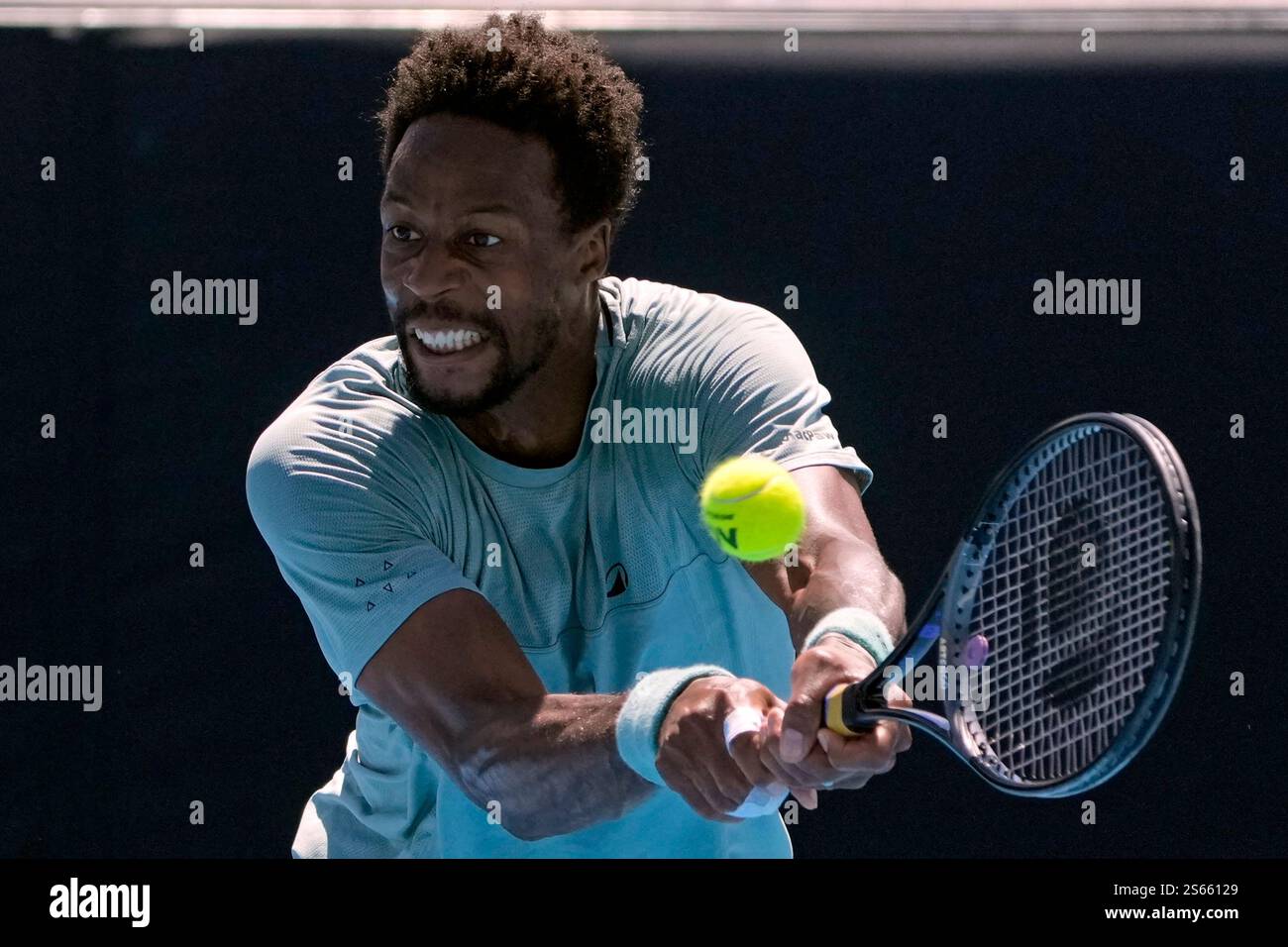 Gael Monfils of France plays a backhand return to Daniel Altmaier of ...