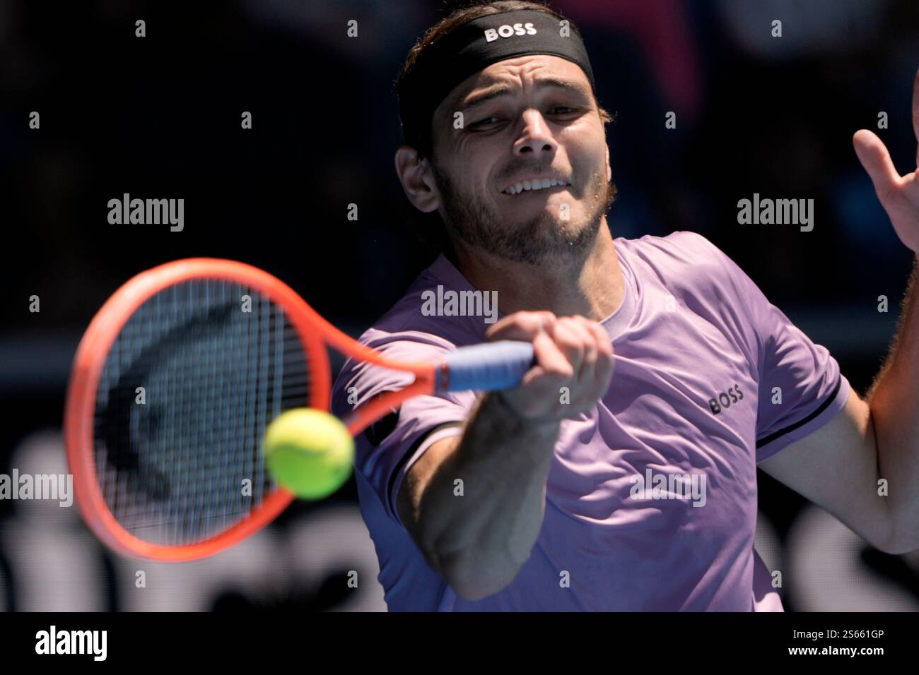 Taylor Fritz of the U.S. plays a forehand return to Cristian Garin of ...