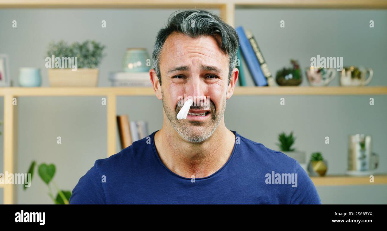 Sick, tissue and portrait of man in home with blocked nose for ...