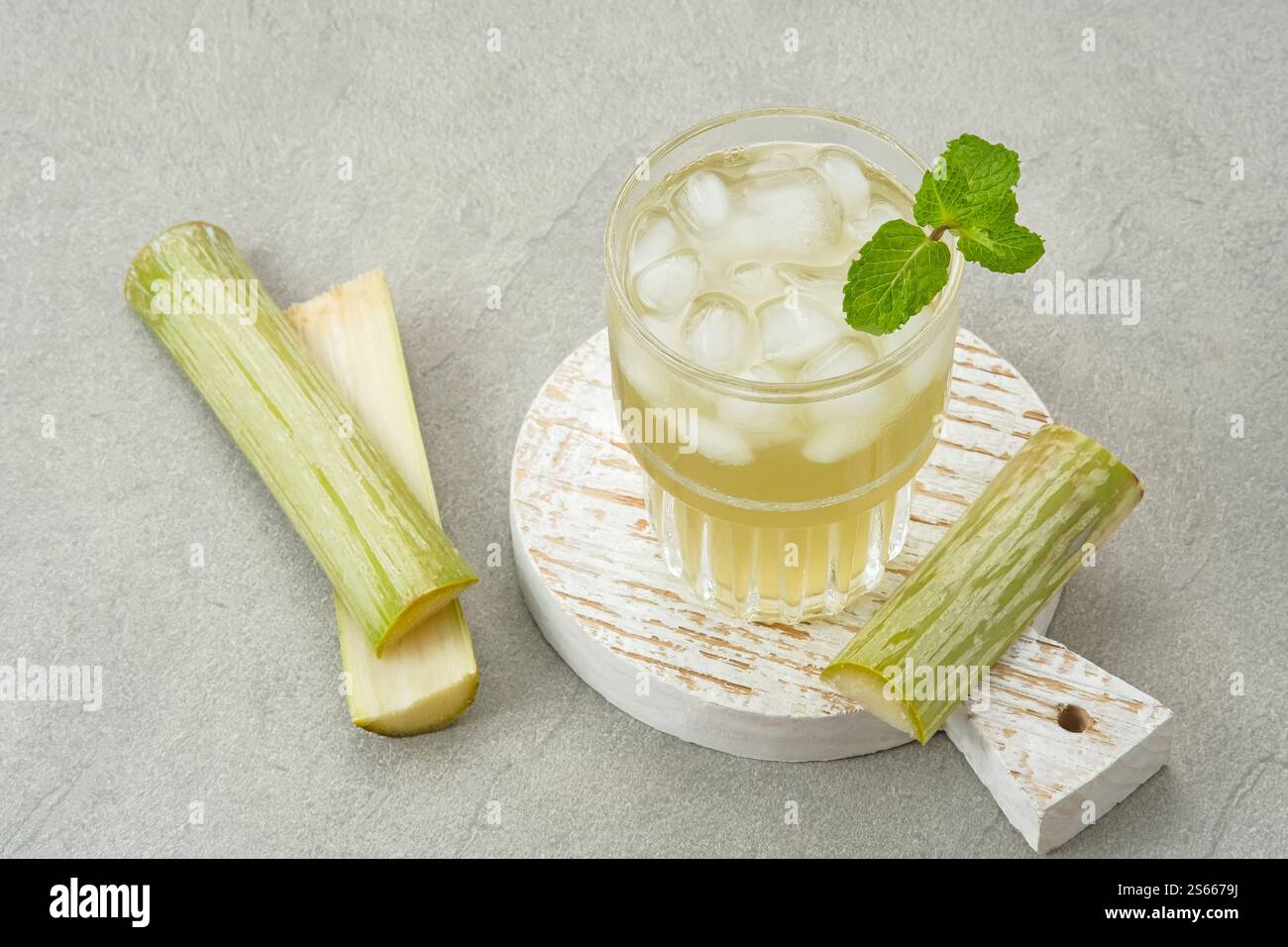 Fresh sugar cane juice (Es Tebu) in glass. Indonesian drink Stock Photo ...