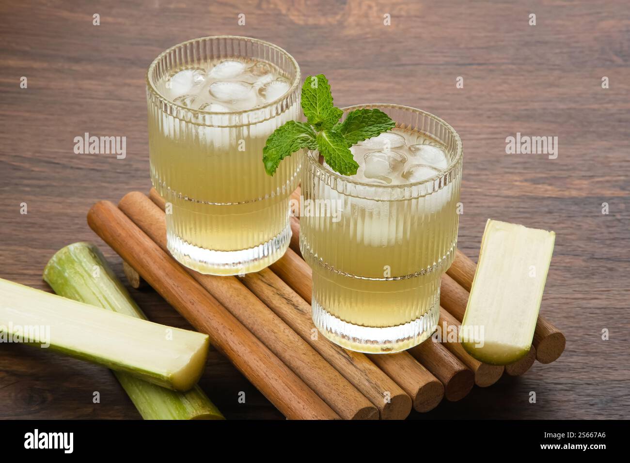 Fresh sugar cane juice (Es Tebu) in glass. Indonesian drink Stock Photo ...