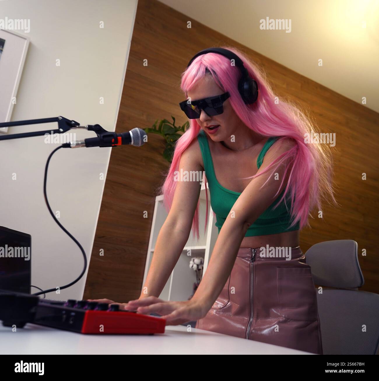 Beautiful young singer and musician broadcast from her home studio ...