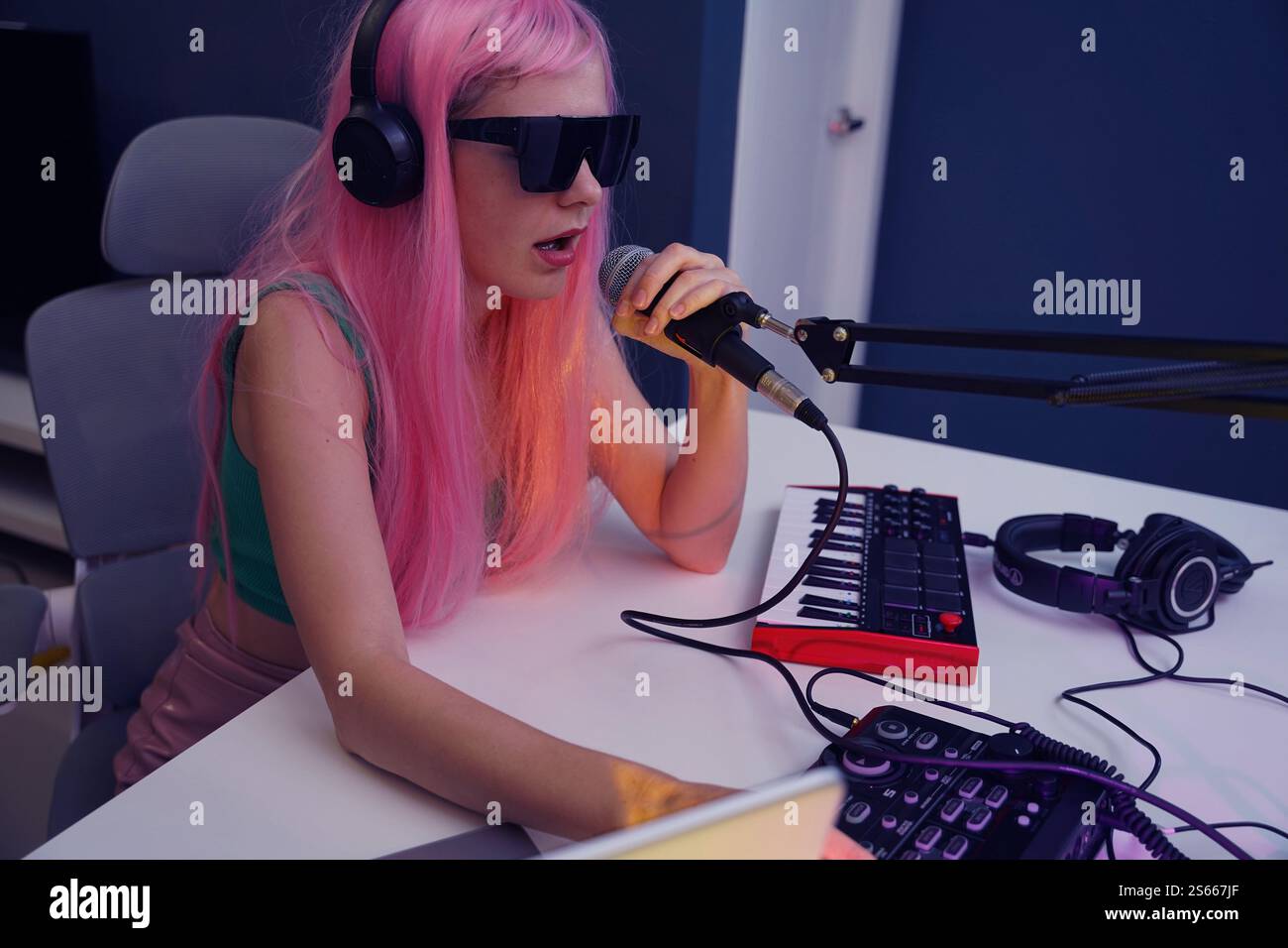 Beautiful young singer and musician broadcast from her home studio ...