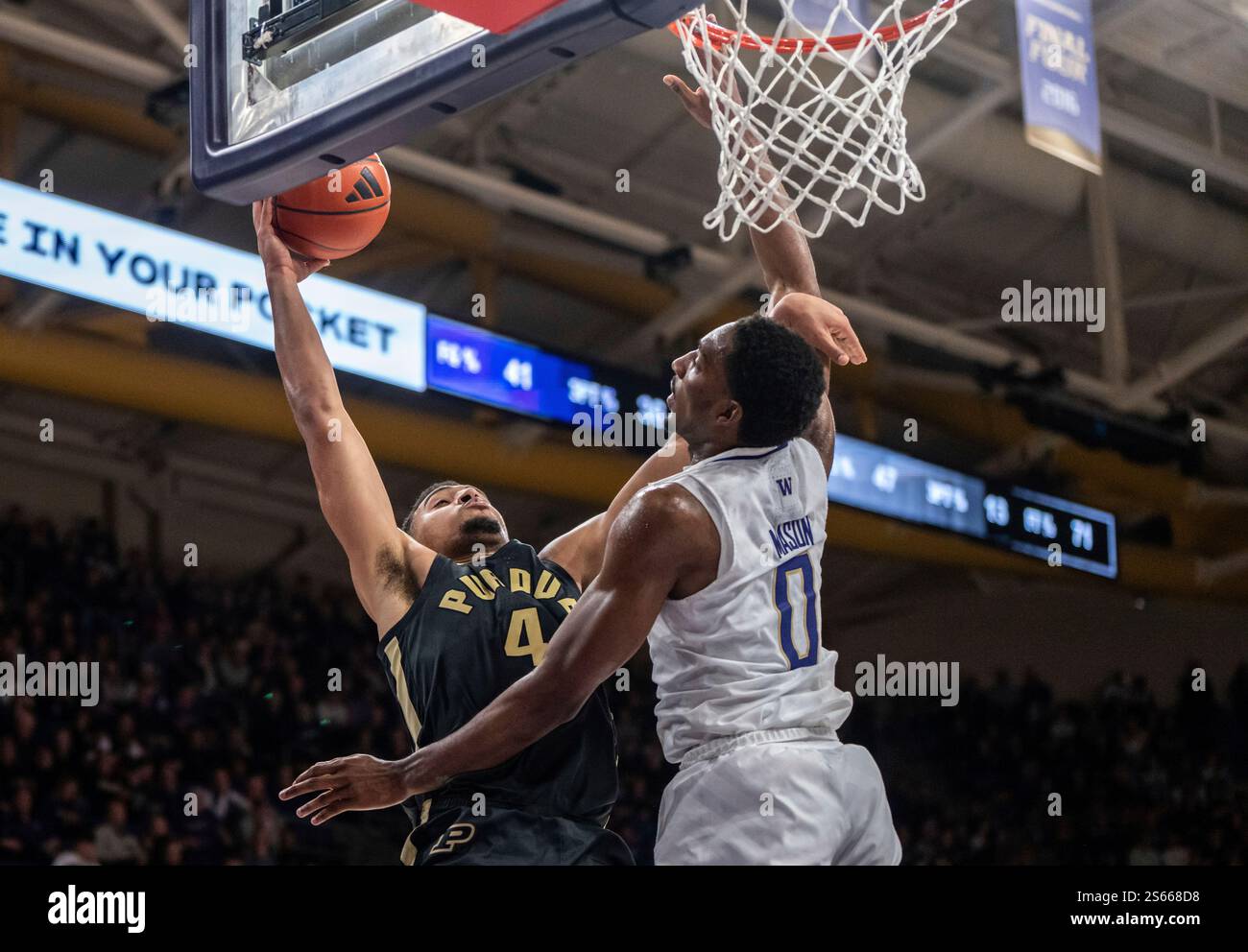 Purdue forward Trey Kaufman-Renn, left, shoots the ball against ...