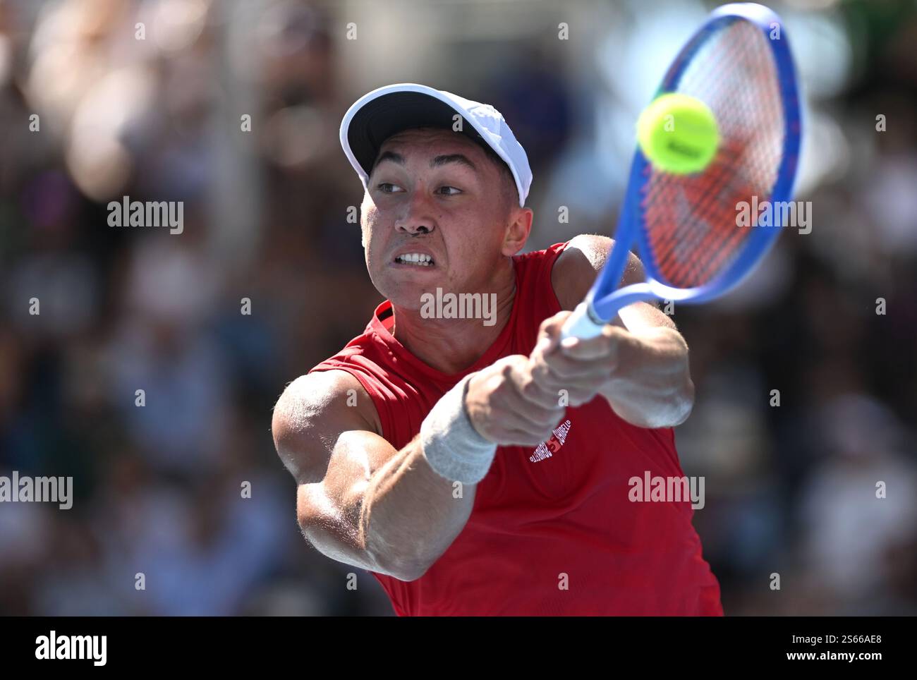 James McCabe of Australia returns during his round 2 match against Alex ...