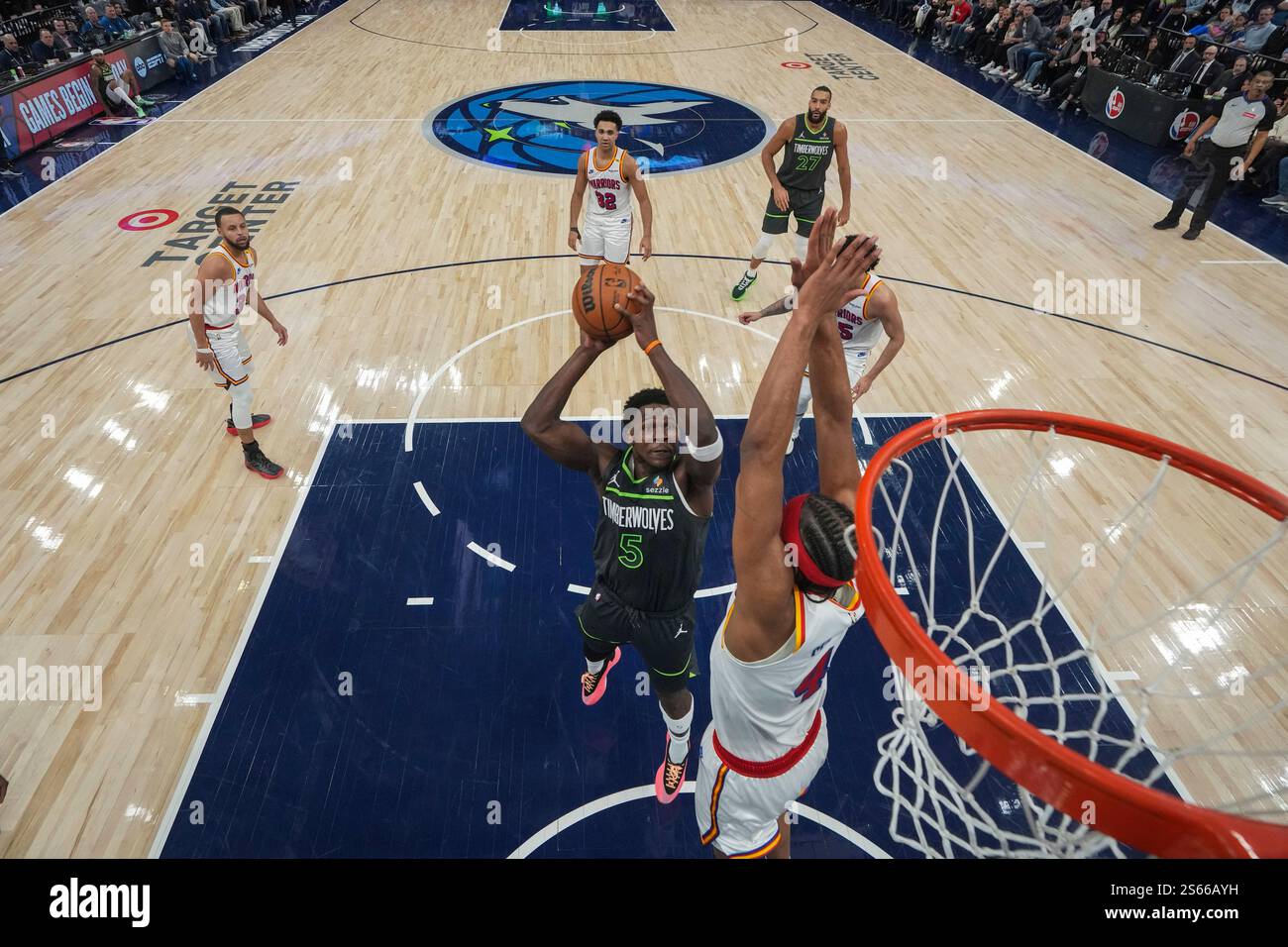 Minnesota Timberwolves guard Anthony Edwards (5) goes up for a shot as ...
