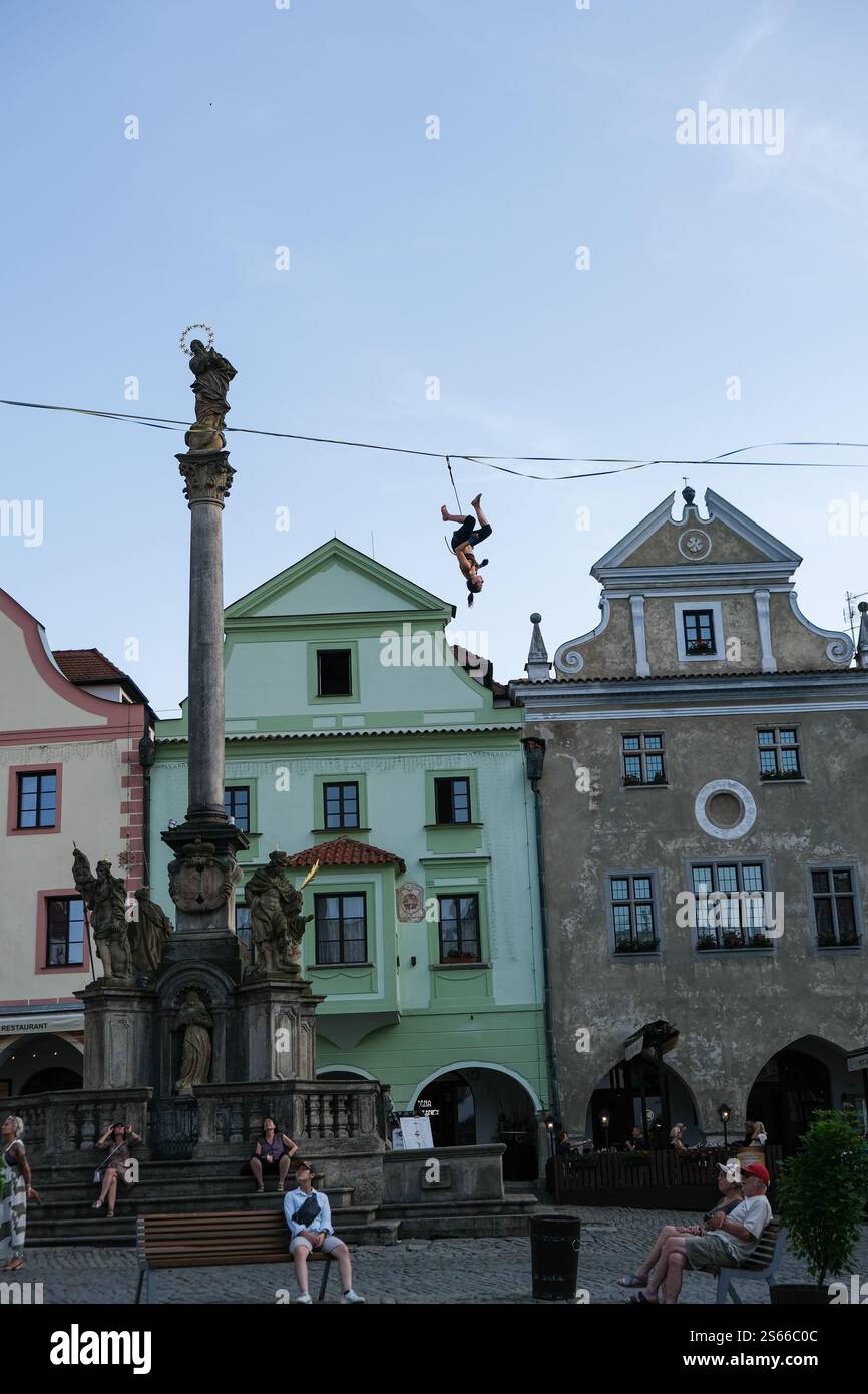 Female Slackliner Performing Above Historic Square Stock Photo - Alamy