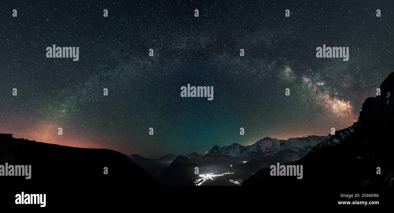 Milky Way arc and stars in night sky over the Swiss Alps with the ...