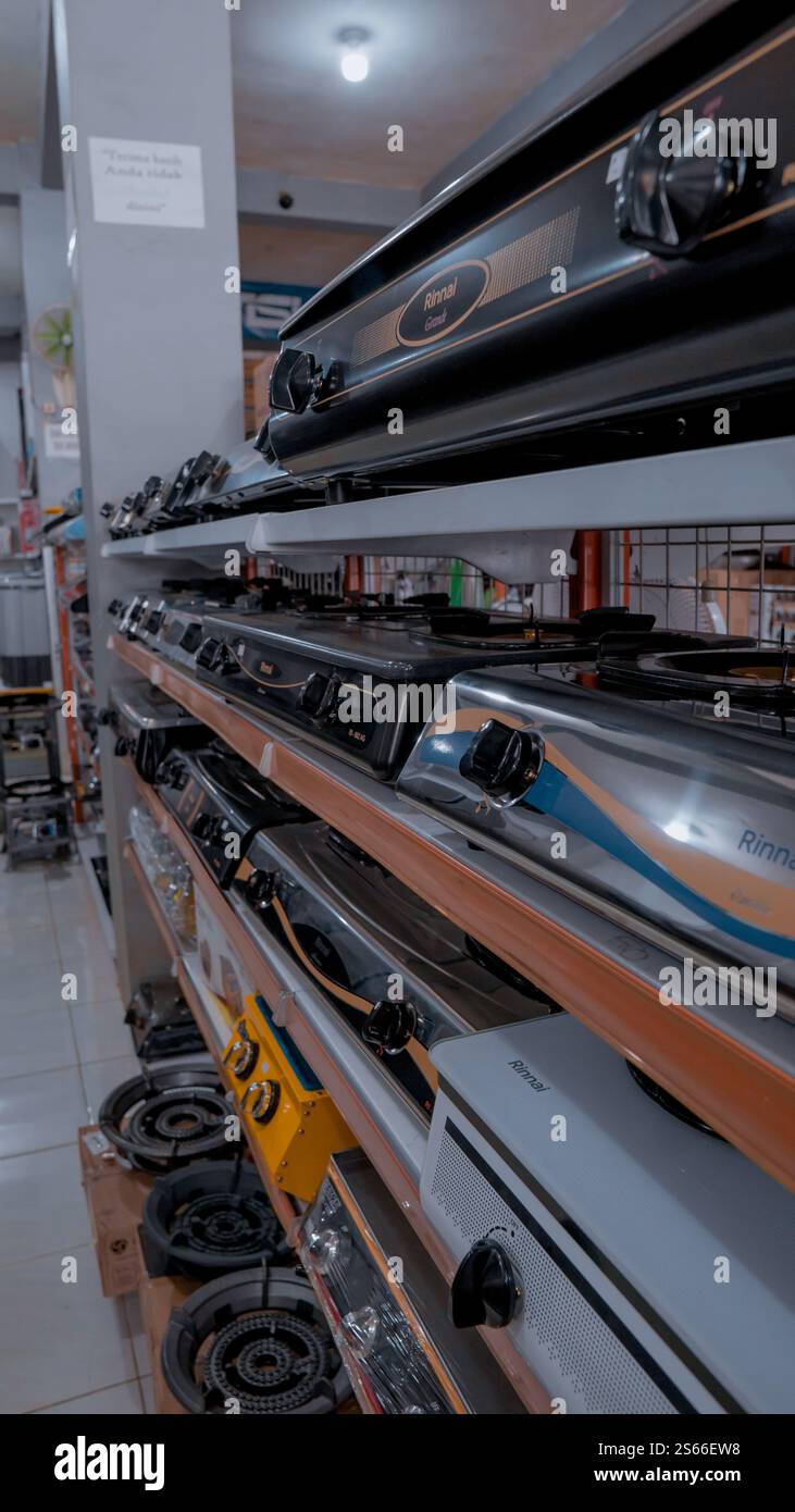 Gas stoves neatly displayed in a store, showcasing diverse designs and ...