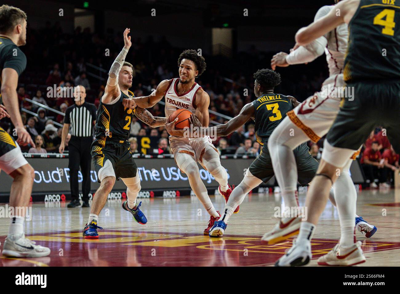 USC Trojans guard Desmond Claude (1) drives against Iowa Hawkeyes guard ...