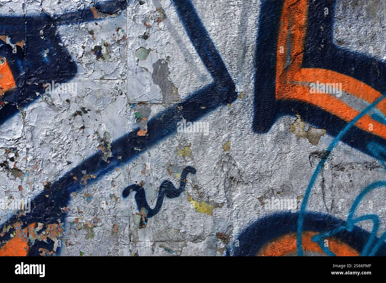 Fragment of an old colored graffiti drawing on the wall. Background ...