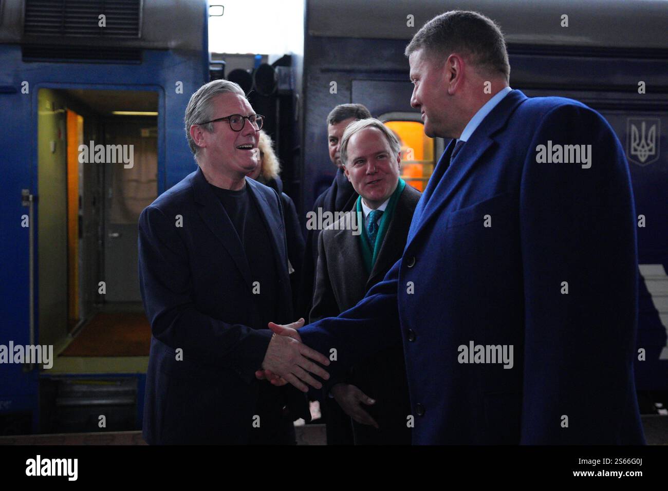 Prime Minister Sir Keir Starmer is greeted by Ukrainian officials and ...