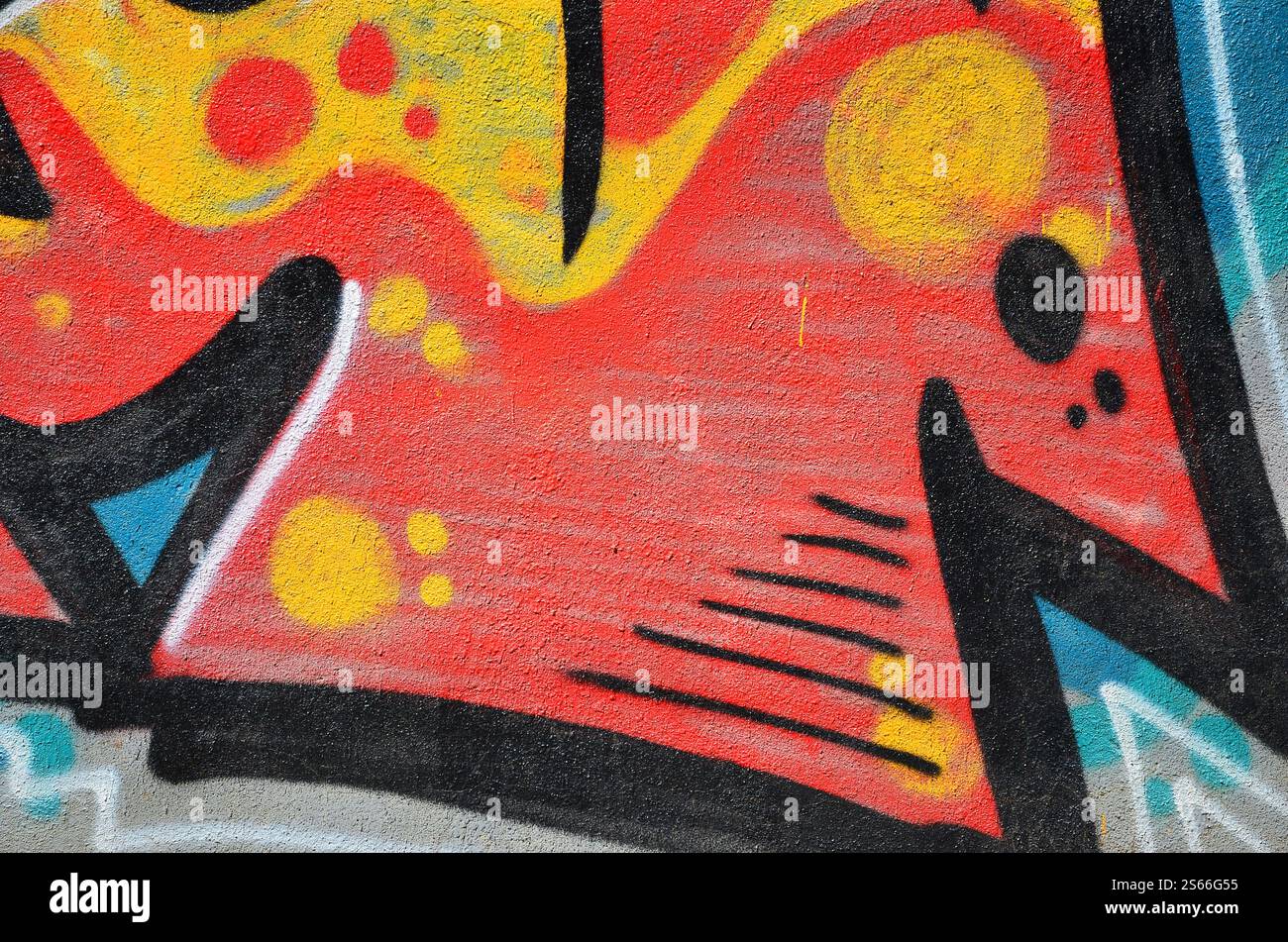 Fragment of an old colored graffiti drawing on the wall. Background ...