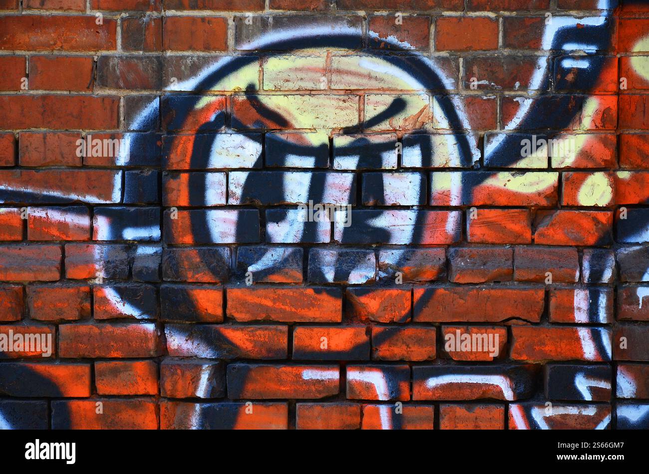 Fragment of an old colored graffiti drawing on the wall. Background ...