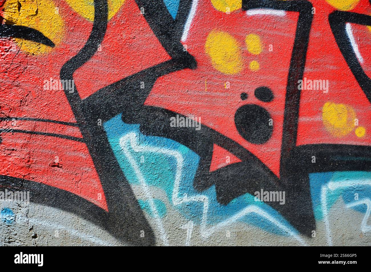 Fragment of an old colored graffiti drawing on the wall. Background ...