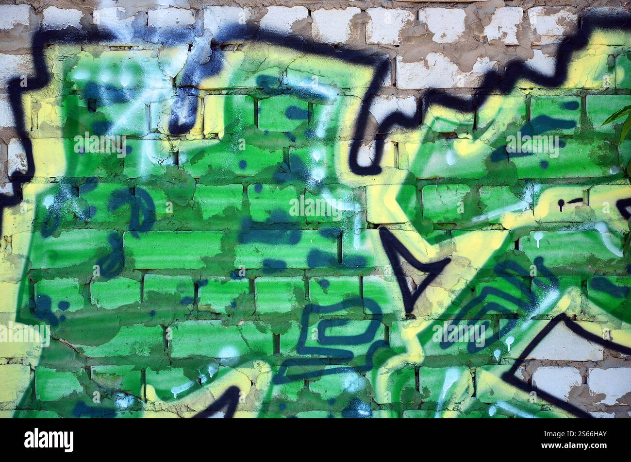 Fragment of an old colored graffiti drawing on the wall. Background ...