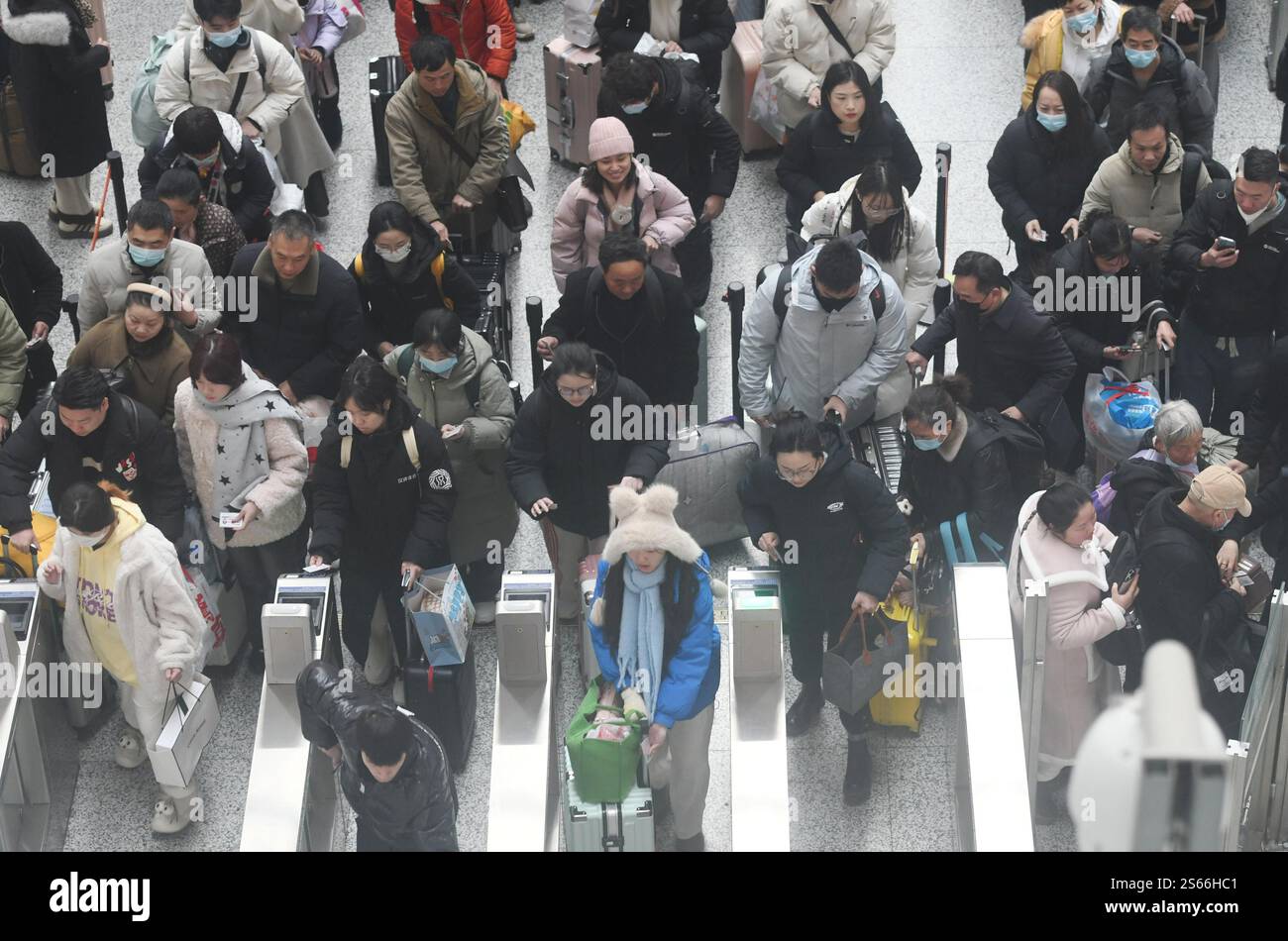 Travelers are seen in Hangzhoudong Railway Station, Hangzhou City, east ...