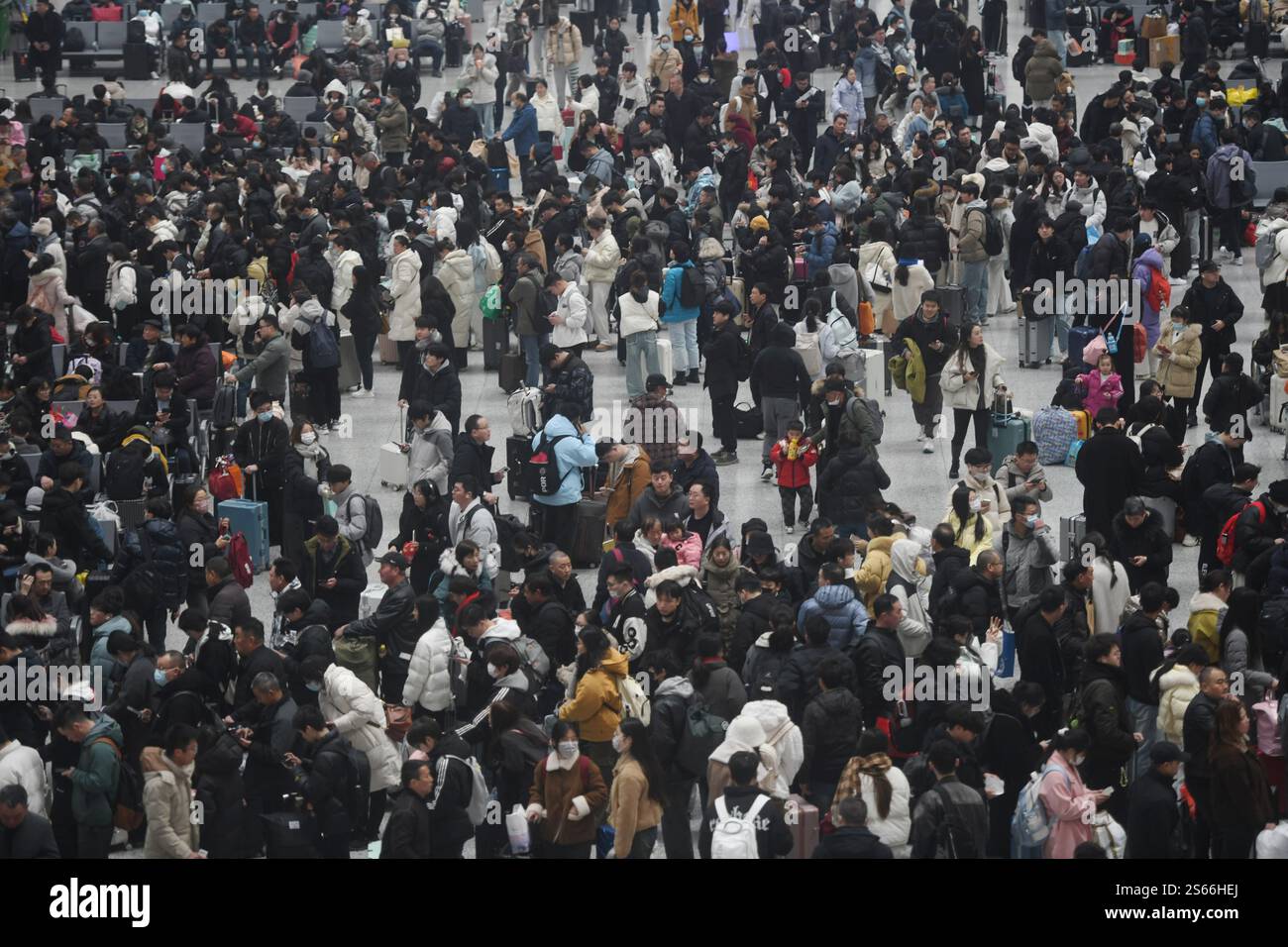 Travelers are seen in Hangzhoudong Railway Station, Hangzhou City, east ...