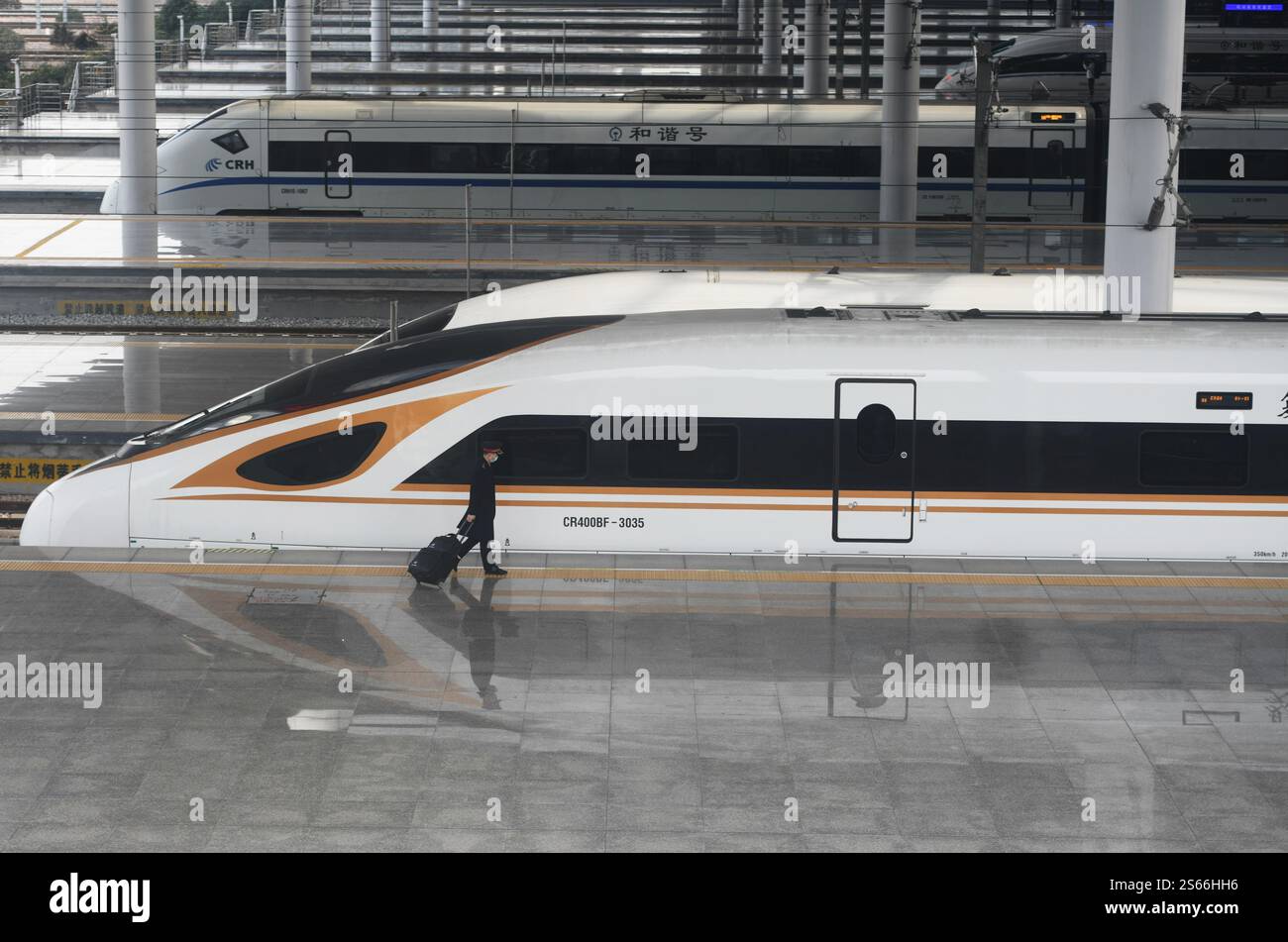 Travelers are seen in Hangzhoudong Railway Station, Hangzhou City, east ...