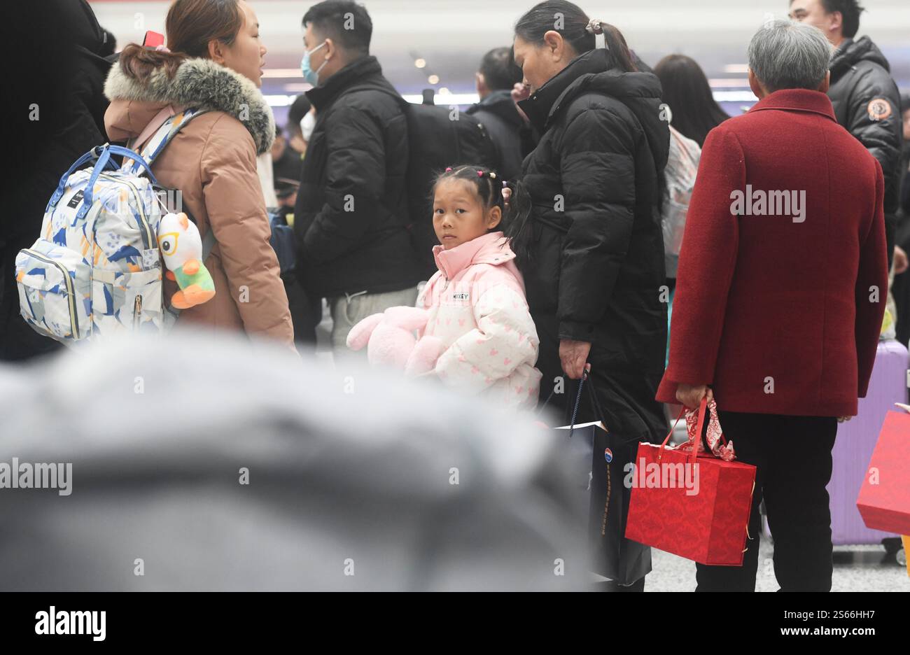 Travelers are seen in Hangzhoudong Railway Station, Hangzhou City, east ...