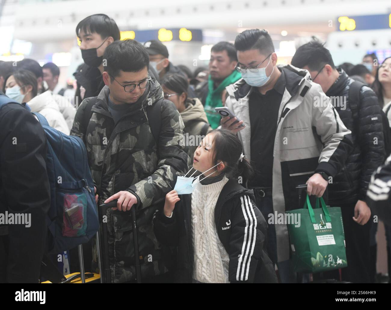 Travelers are seen in Hangzhoudong Railway Station, Hangzhou City, east ...