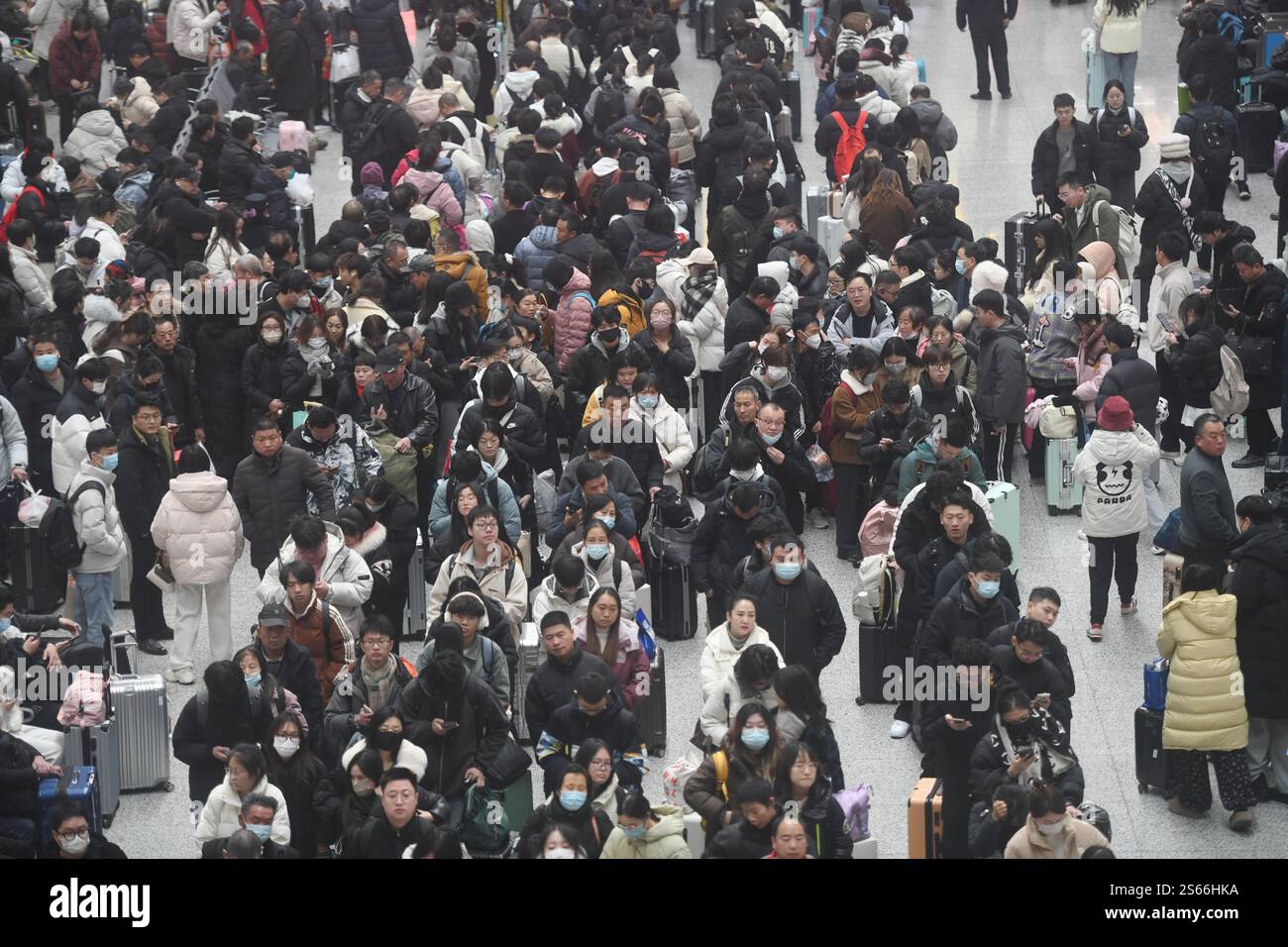 Travelers are seen in Hangzhoudong Railway Station, Hangzhou City, east ...