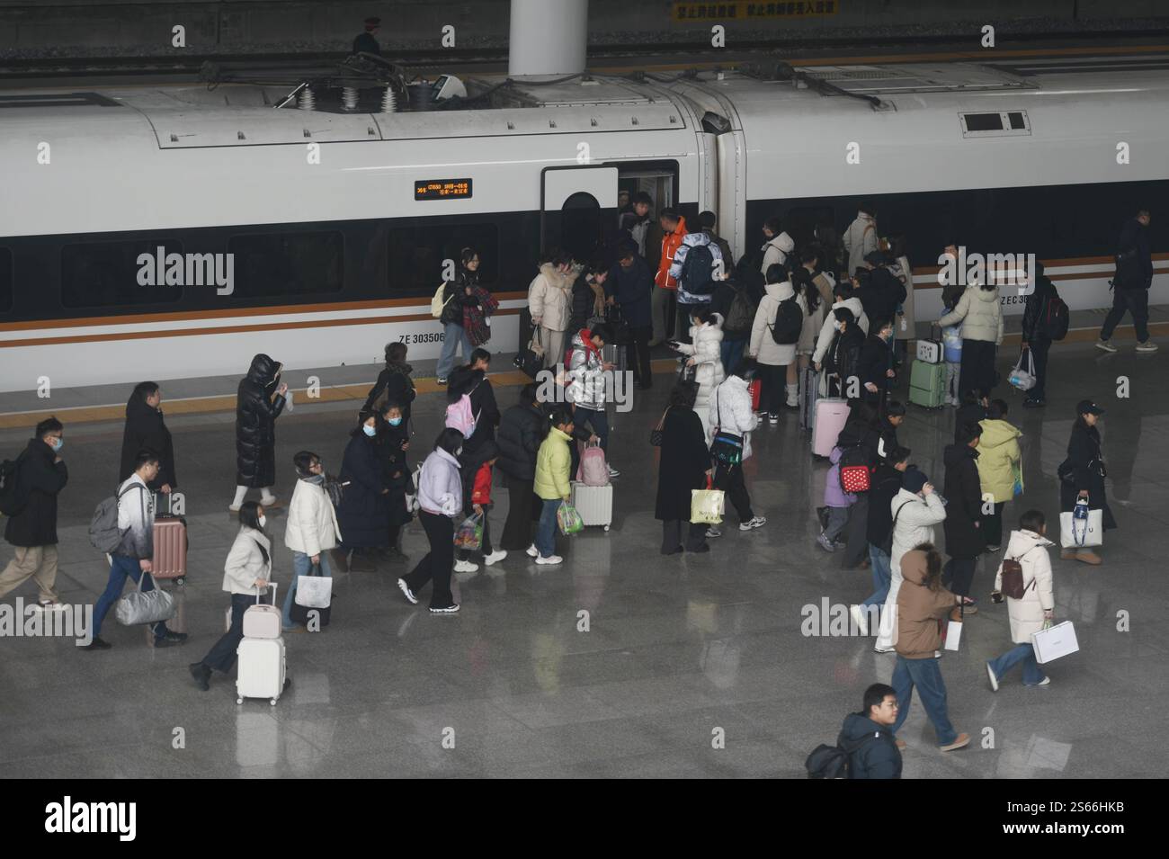 Travelers are seen in Hangzhoudong Railway Station, Hangzhou City, east ...