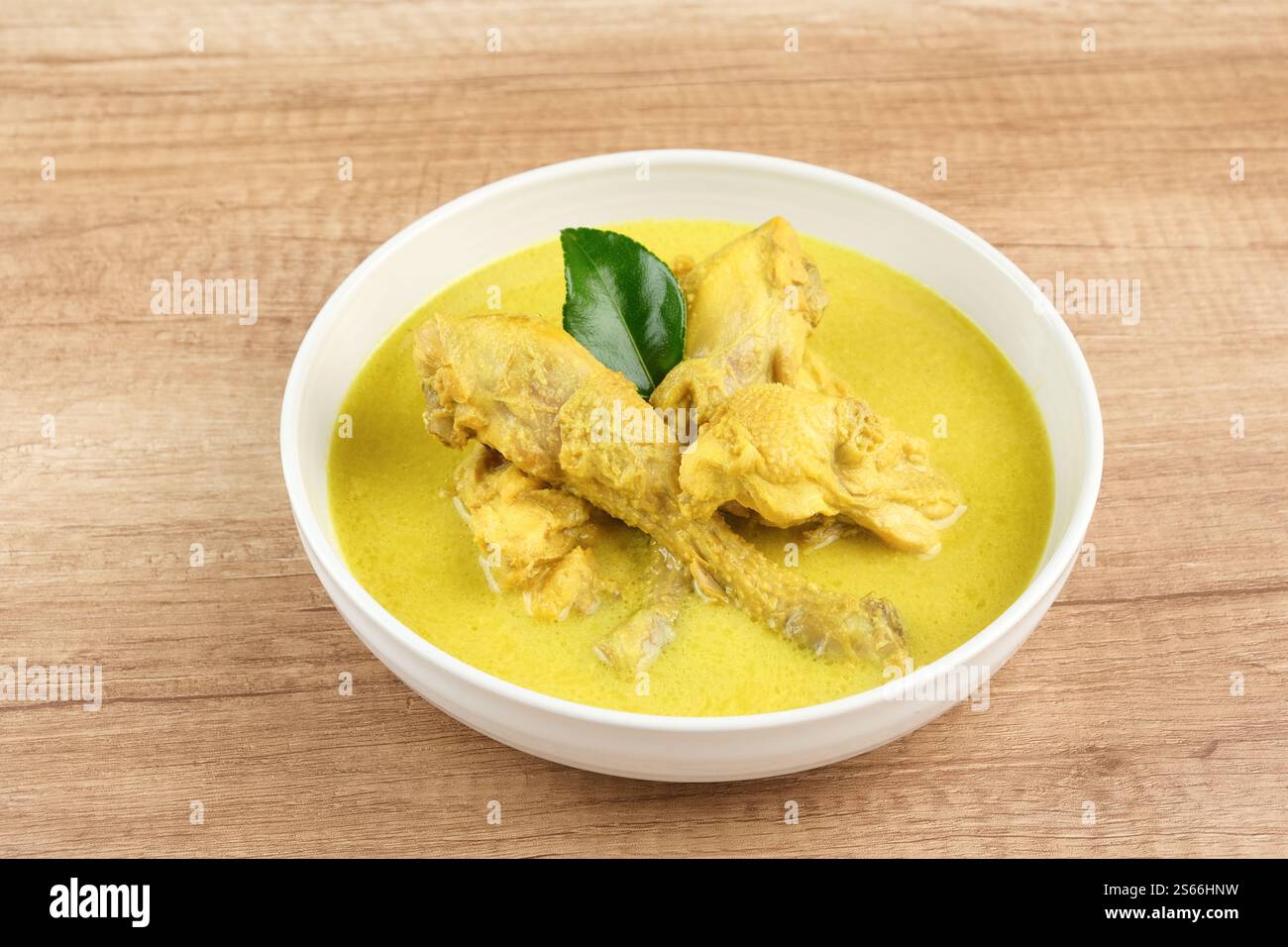 Opor Ayam, Indonesian traditional food, made from chicken cooked with ...