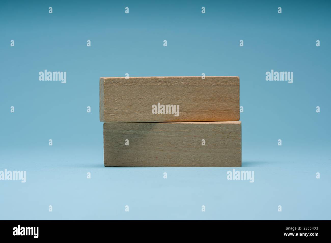 Blank wooden blocks on a blue background that can be written on Stock ...
